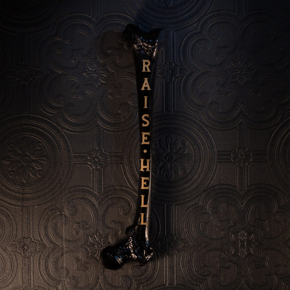 Raise Hell - Engraved Femur Bone – The Blackened Teeth Ltd